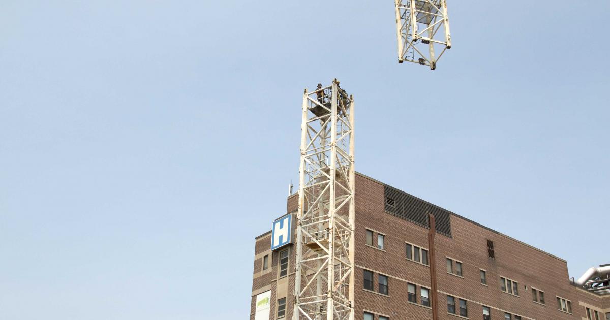 Let the building begin! First of two cranes installed at MGH | Michael ...